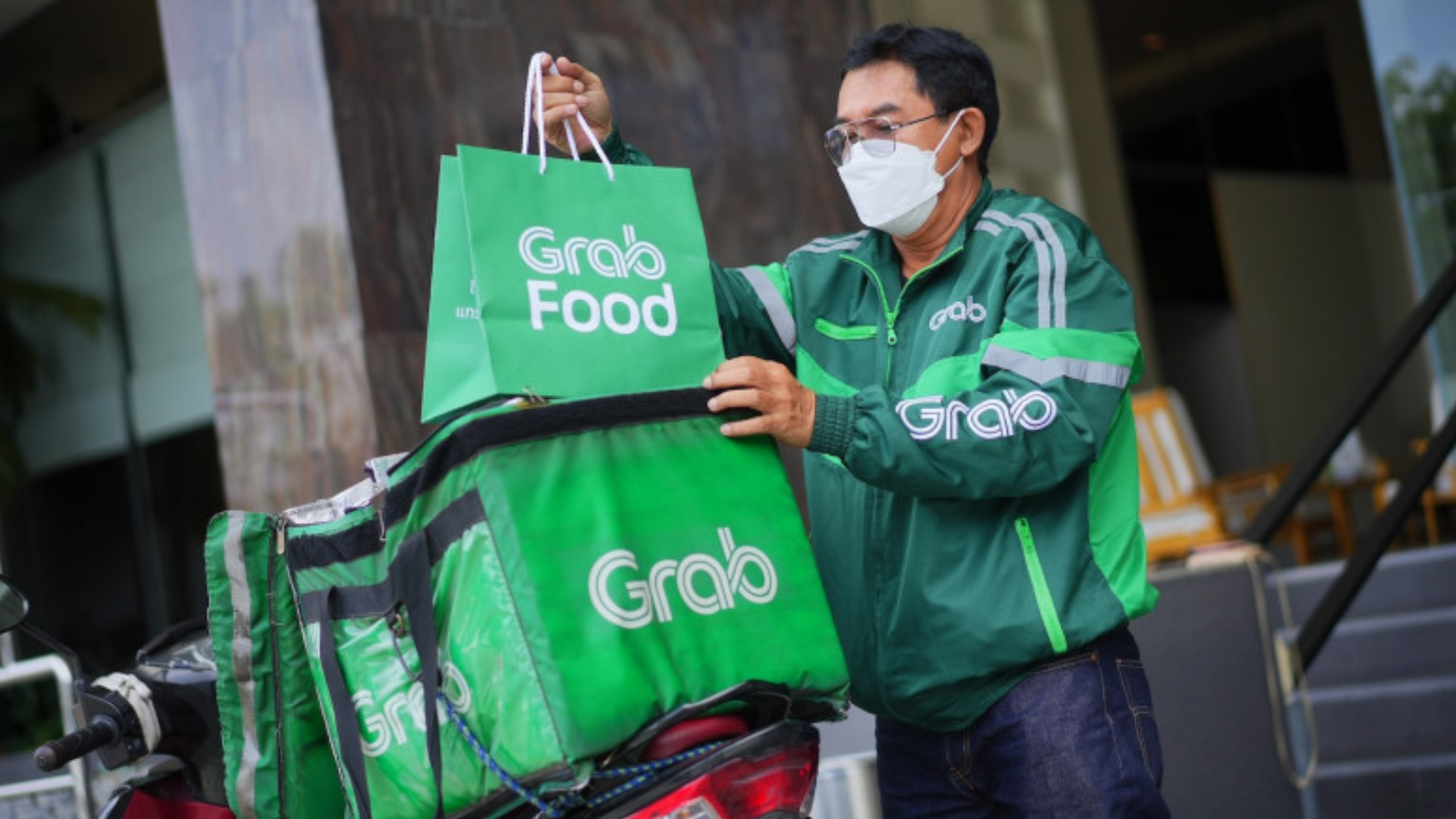 Grab Holdings Achieves First-ever Adjusted Profit Amid Intense Market ...